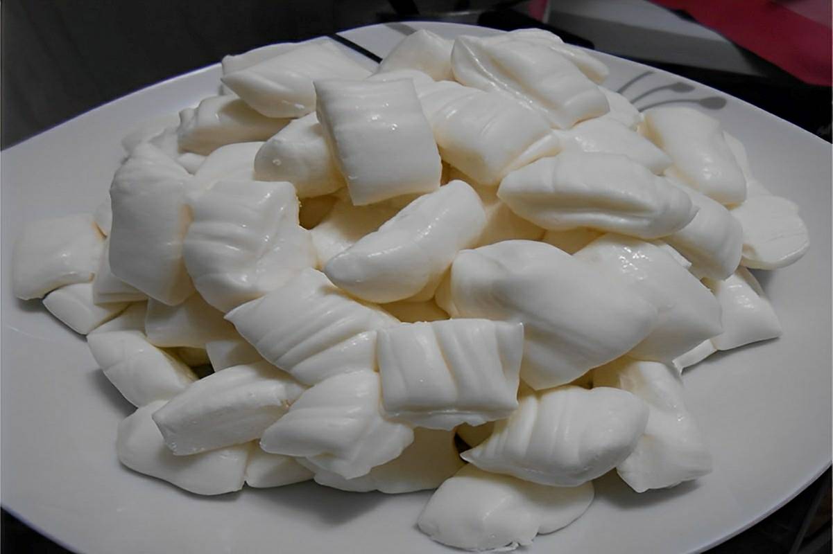 Bala de coco uma receita deliciosa para relembrar o sabor das festas ...